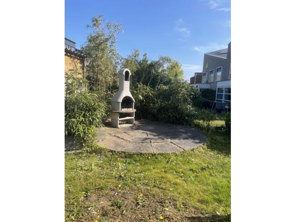 Rond terras met barbecue in 's-Gravenhage - Tuin en Terras, Tegels en ...